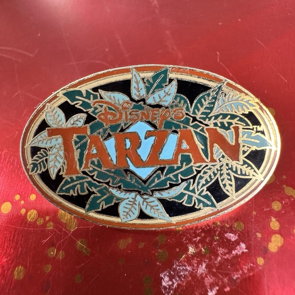 Disney | Jewelry | Disneys Tarzan Logo Word With Leaves Oval Pin 347 ...